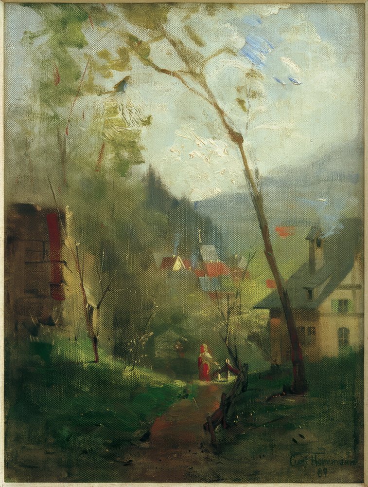 風景の前に赤いドレスを着た女性